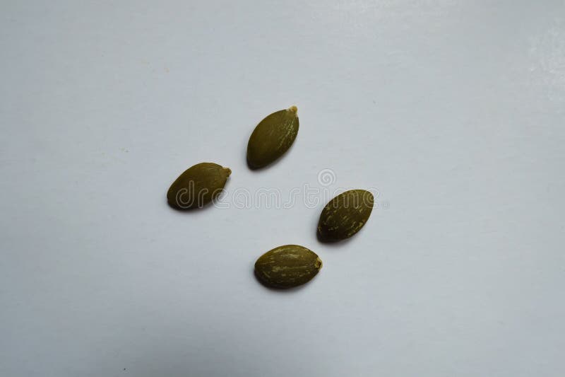Four Kernels of Pumpkin Seeds from Above Stock Image - Image of eatable ...