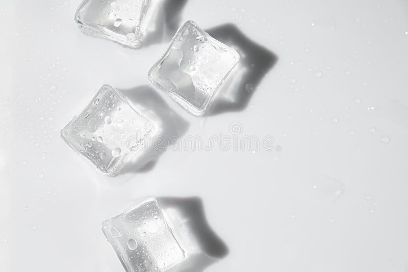 Four Ice Cubes on a Gray Background. Top View on Four Ice Cubes Stock ...