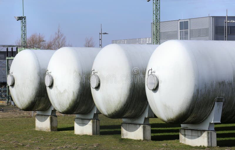 Four Industrial Gas Tanks in a Row Stock Photo - Image of industry ...