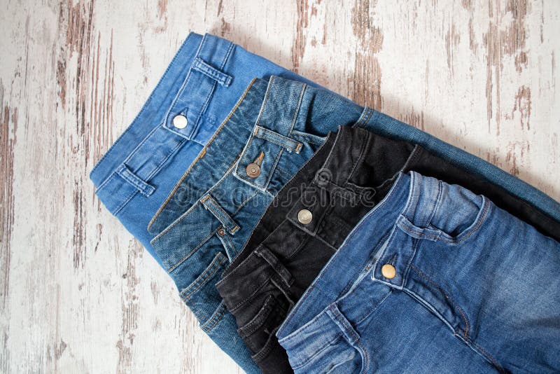 Four Jeans of Different Colors, Assortment. Fashionable Concept Stock ...