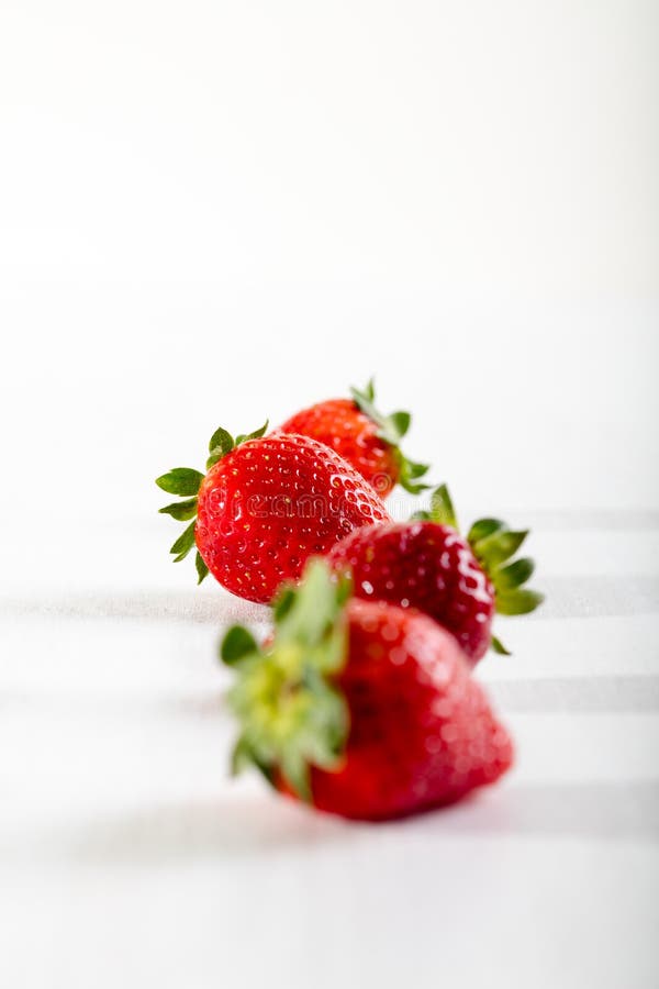 Four Juicy Strawberry on the Table Stock Image - Image of breakfast ...