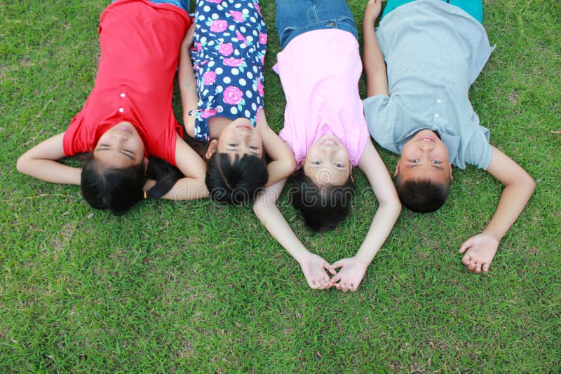 Four Kids Having Fun in the Park. Stock Photo - Image of funny, four ...