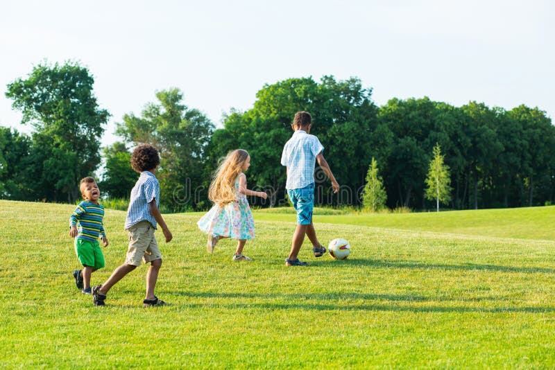 Four Kids are Playing on Sunset. Stock Image - Image of afro, nature ...