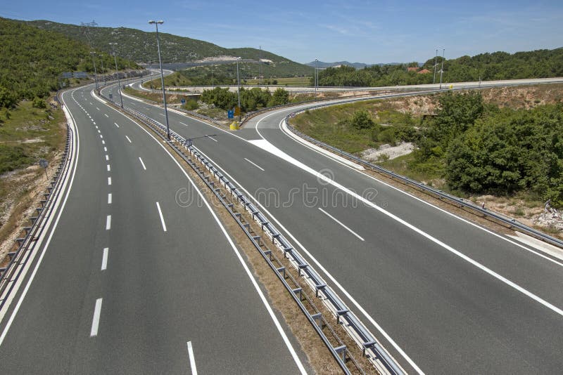 Four lane road stock photo. Image of freeway, modern - 57401692