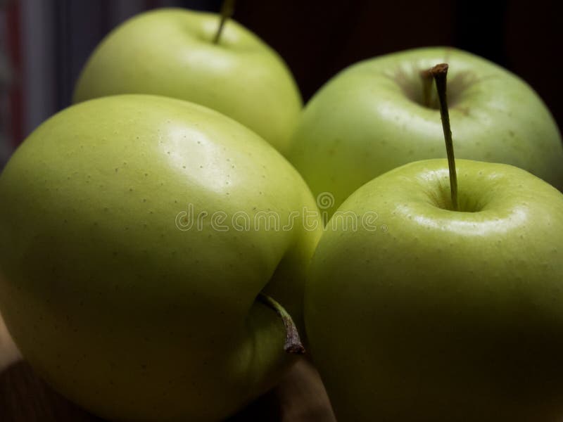 Four Large Apples, Close-up. Fruit on a Wooden Surface Stock Image ...