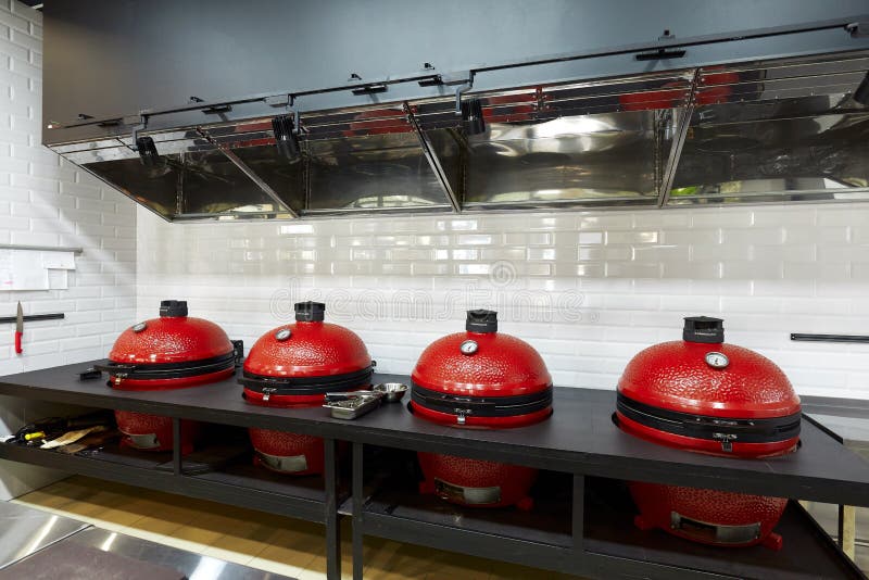 Four Large Red Grills Stand in the Kitchen, Equipment Stock Image ...