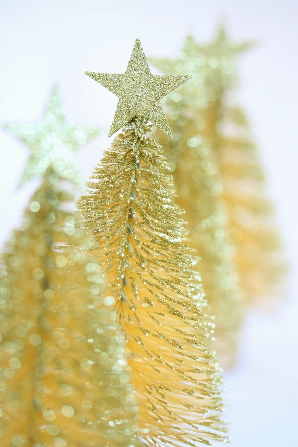 Four Little Gold Christmas Trees Stock Photo - Image of trees, xmas ...