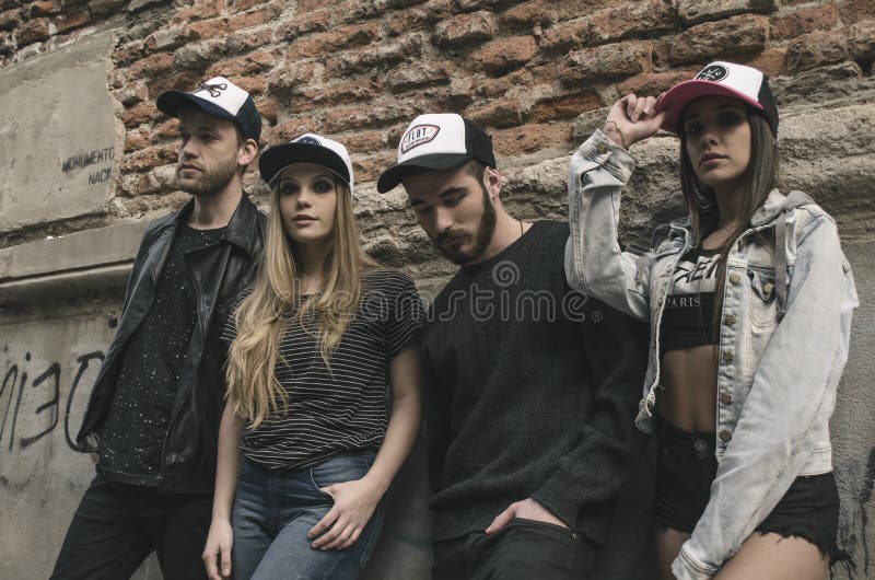 Four Man And Woman Standing Near Building Structure Picture. Image ...