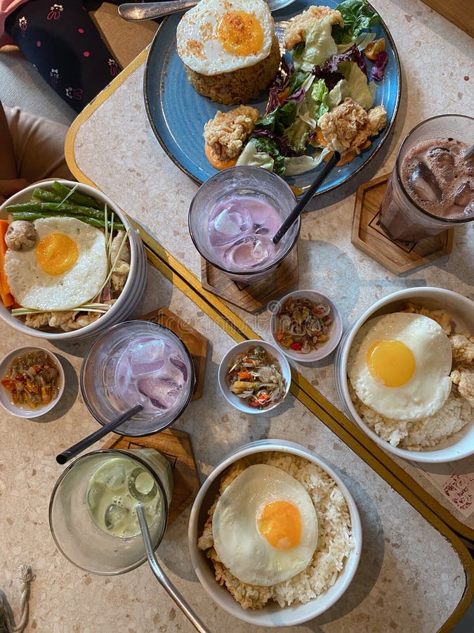 Four Meals and Beverages Served on the Table Stock Photo - Image of ...