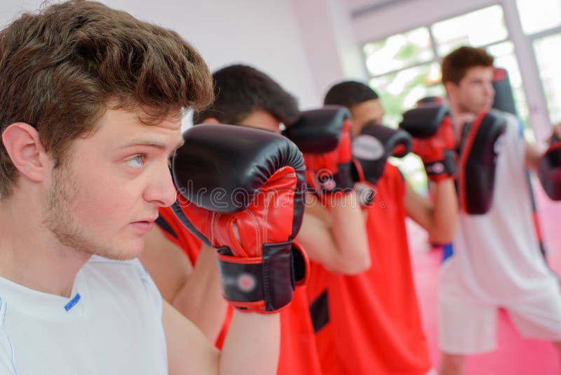 Four Men Lined Up in Boxing Class Stock Image - Image of class, boxing ...