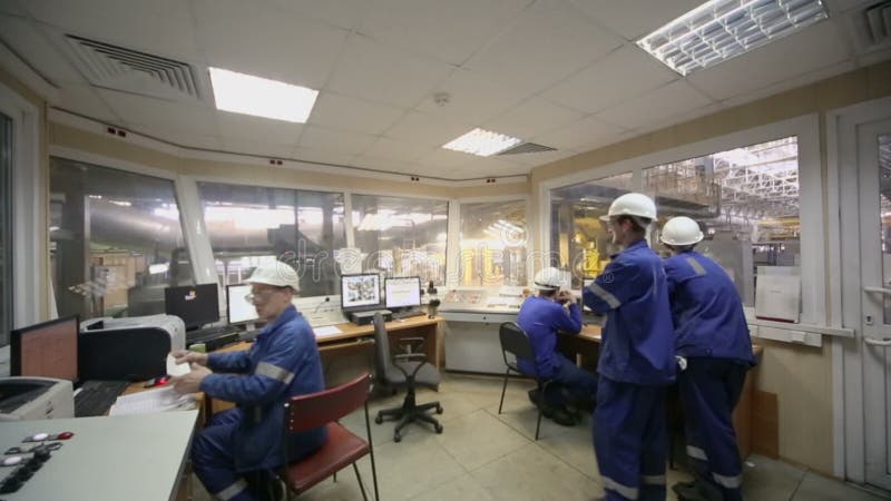 Four Men Work in Room of Control Devices in Stock Video - Video of four ...