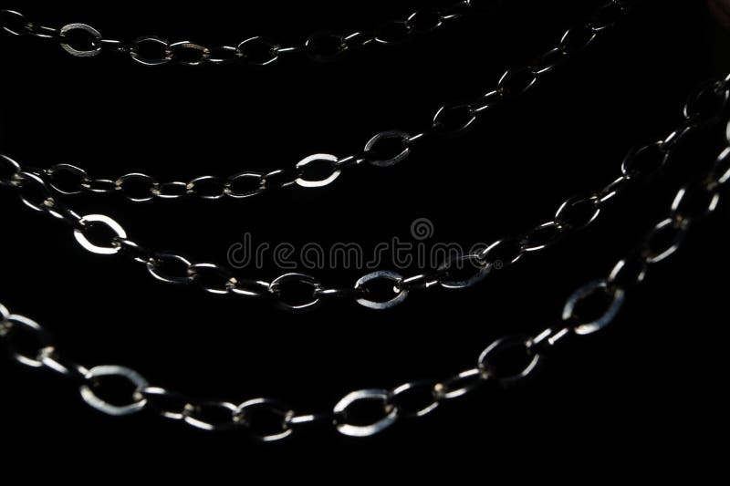 Metallic Silver Chains Isolated on a Black Background Stock Photo ...