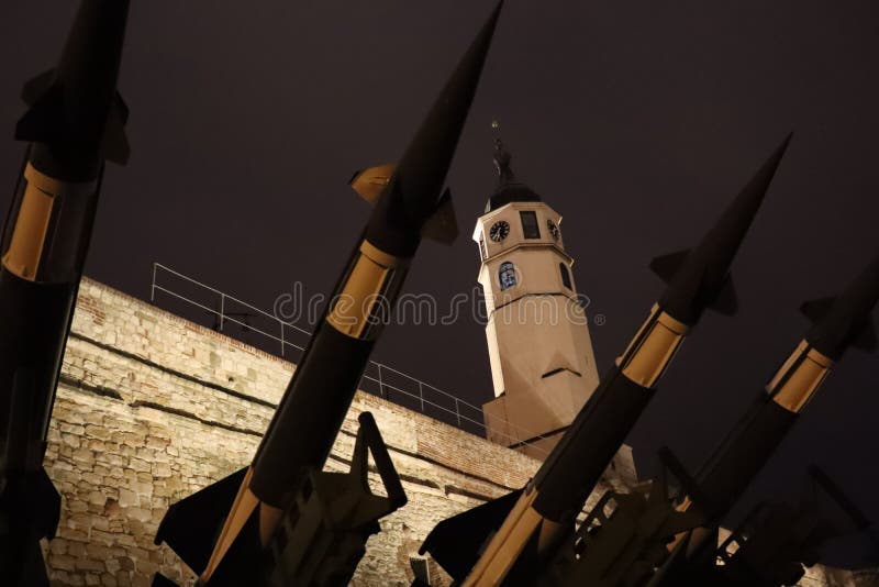 Four Missile and Tower Clock Stock Photo - Image of military, missile ...