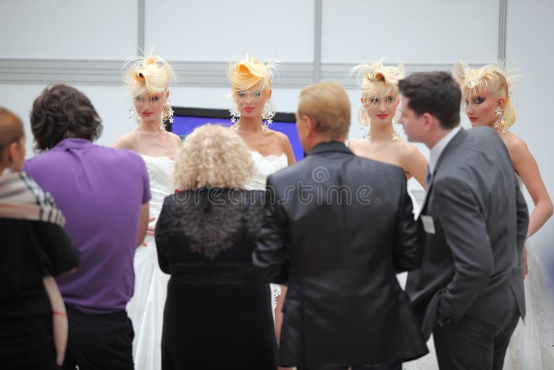 Four Models with Fanciful Hairdo and Photographers Editorial Stock ...