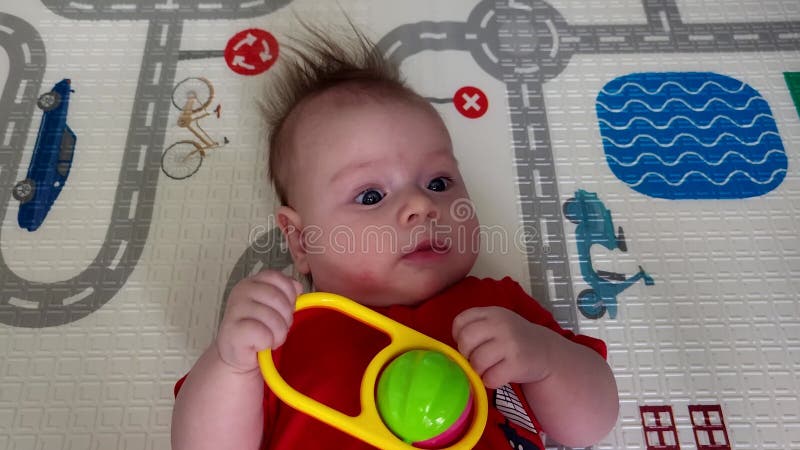 A Four-Month-Old Girl Plays on Daddy S Lap Stock Video - Video of cute ...