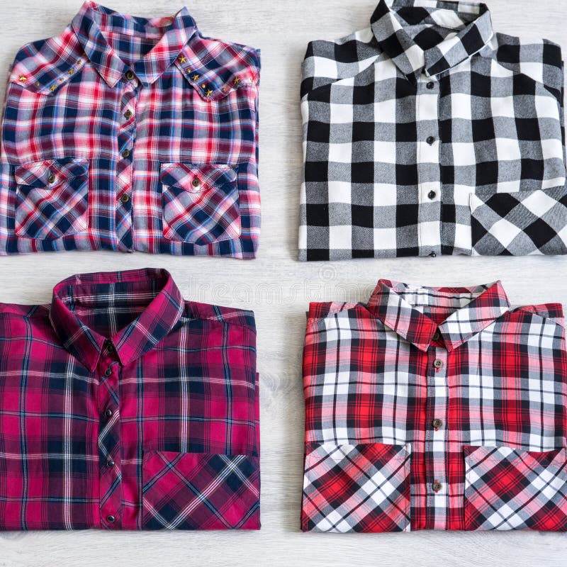 Four Multi-colored Checkered Women`s Shirts Lying Neatly Folded Stock ... Four Multi-colored Checkered Women`s Shirts Lying Neatly Folded Stock ...