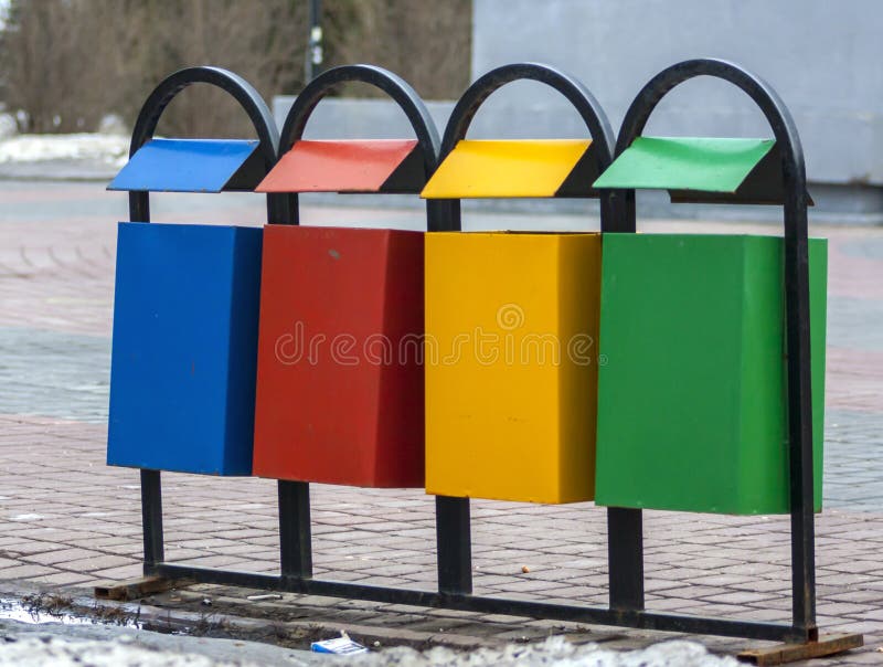 Four Multi-colored Garbage Bins Stock Image - Image of recycle, dustbin ...