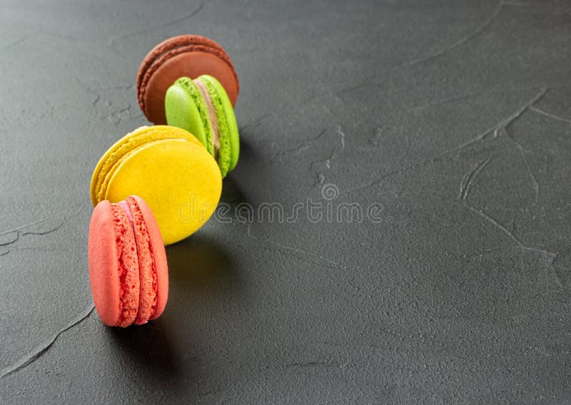 Four Multicolored Macaroons Stock Photo - Image of green, bake: 166413734