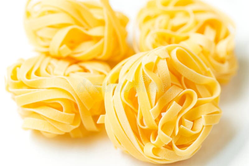 Dry Pasta Tagliatelle on Tablecloth Stock Photo - Image of kitchen ...