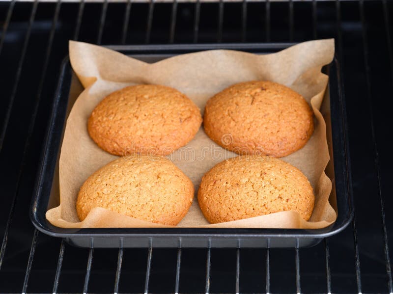 Four Oatmeal Cookies in Baked Tray in an Oven Stock Image - Image of ...