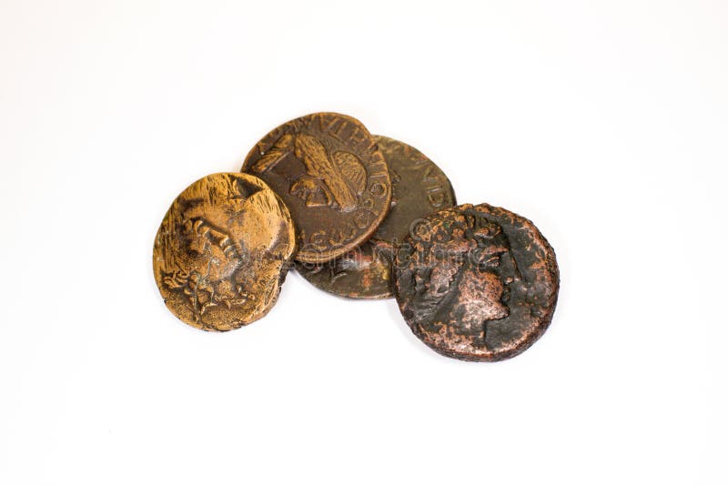 Four Old Coins with Portraits of Emperors on a White Background Stock ...