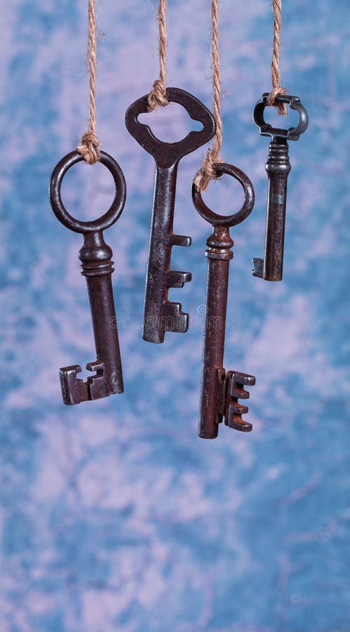 Four Old Keys Hanging on Blue Stock Photo - Image of safety, rusty ...