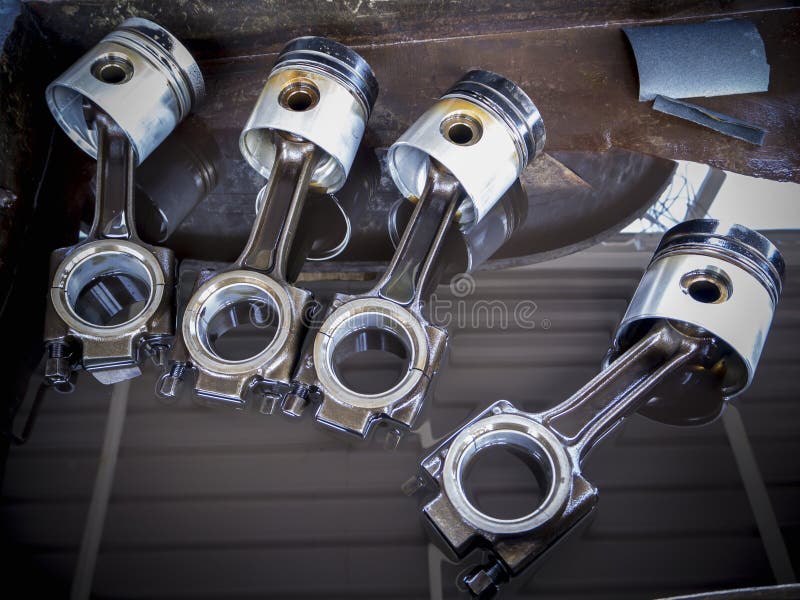 Four old pistons stock photo. Image of carving, metal - 86251404