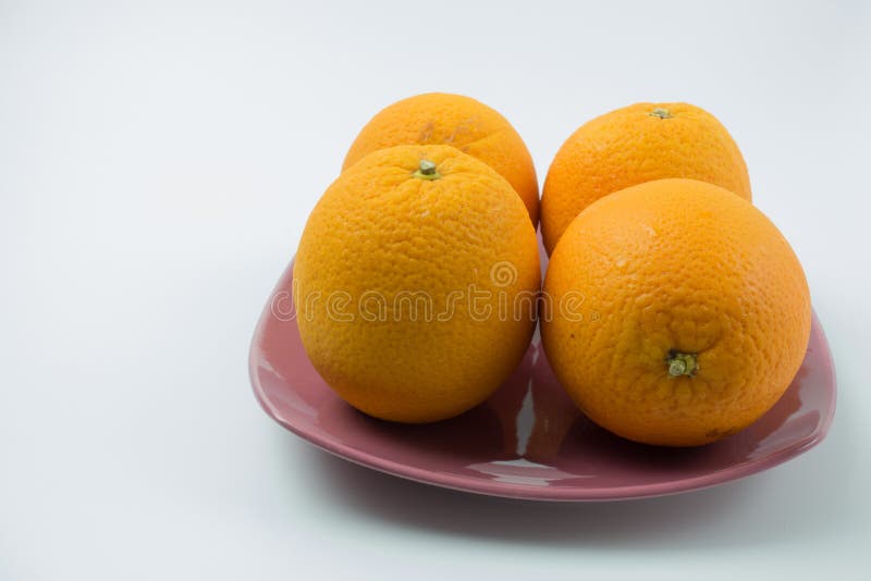 Four Orange on White Background Stock Image - Image of circle, product ...
