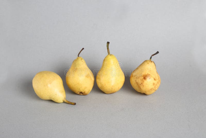 Four Pears Isolated on Gray Background Stock Photo - Image of gray ...