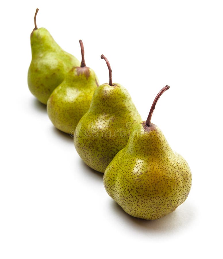Four pears in a row stock image. Image of four, green - 11469579
