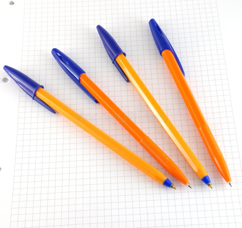 Four Pen on the Checked Paper Stock Image - Image of writing, back ...