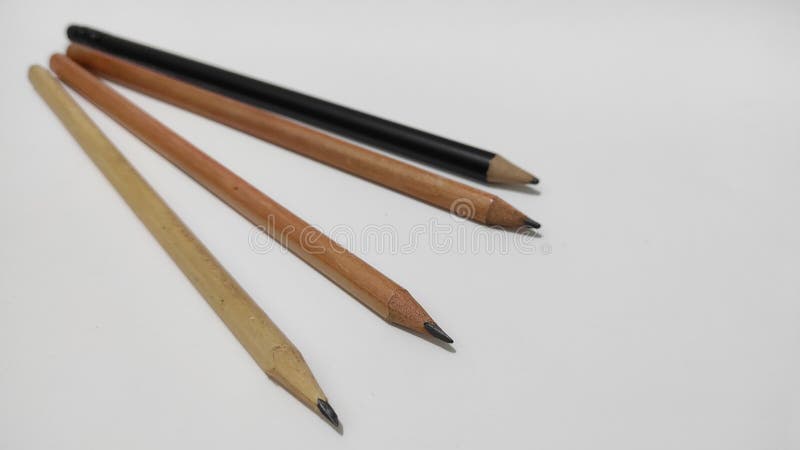 Four Pencils on a White Background Stock Image - Image of background ...