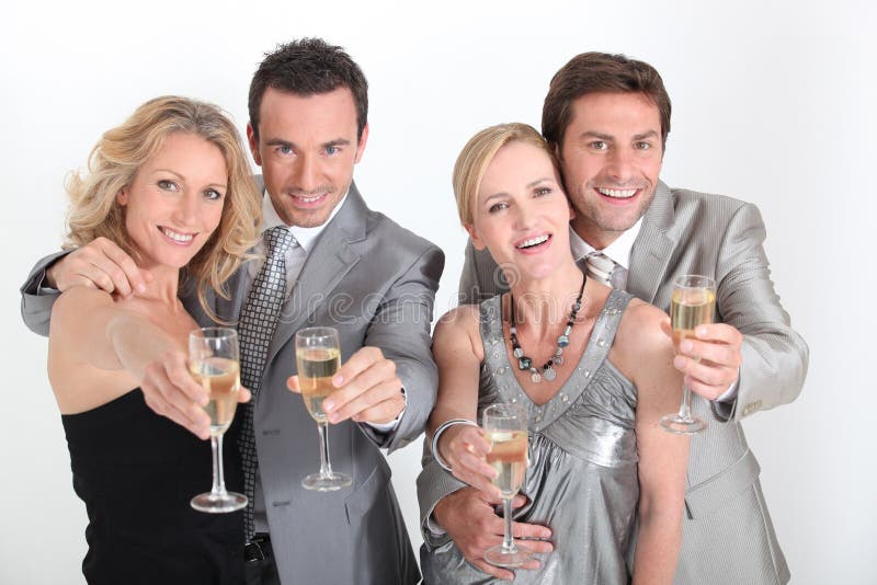 Four people celebrating stock image. Image of blond, objects - 23697825