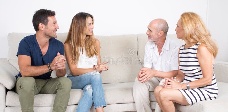 Four Persons Talking on Sofa Stock Image - Image of daughter, living ...
