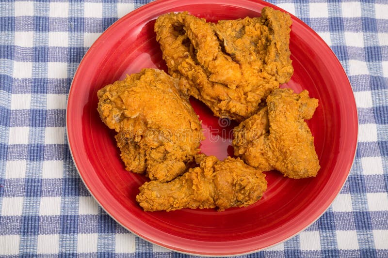 Four Pieces of Fried Chicken on Red Plate Stock Photo - Image of snack ...
