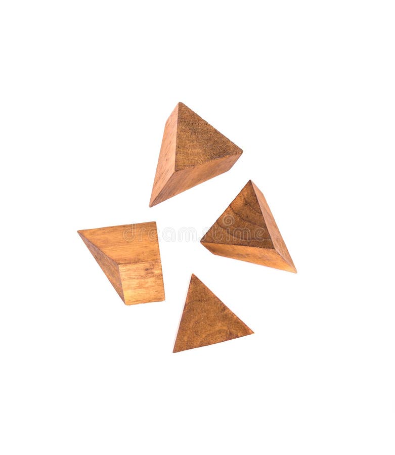 Four Pieces of a Wooden Pyramid Puzzle. Stock Image - Image of ...