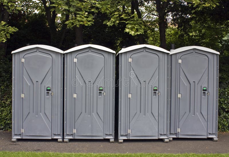 Four portable toilets stock image. Image of portable - 14807355