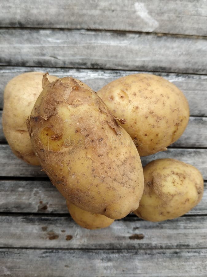 Four Potatoes, Full Nutritional Ingredients, on a Bamboo Board Stock ...