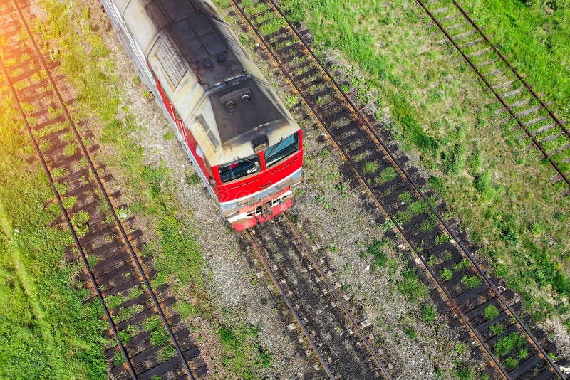 Four Railway Tracks and a Red Locomotive on One of Them Stock Photo ...