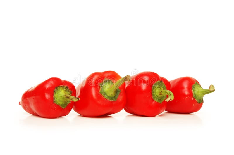 Four red chili peppers stock image. Image of colors, chilies - 1570433