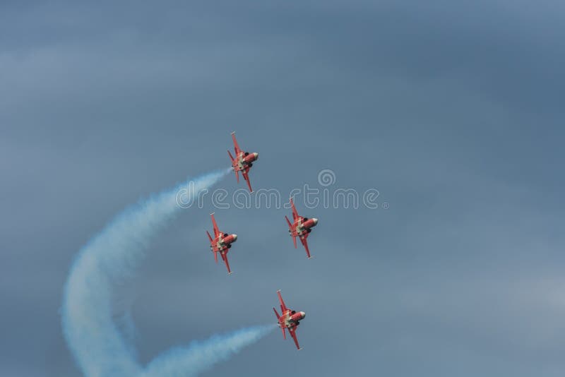 Four Red Planes Fly a Curve with Smoke Editorial Stock Image - Image of ...