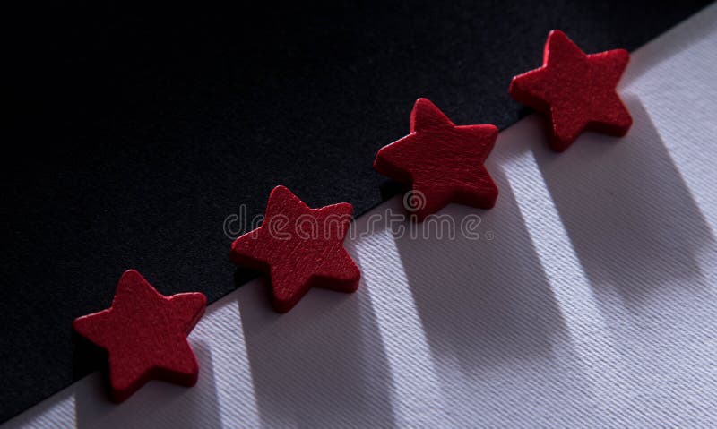 Four Red Stars on White and Black Background Stock Photo - Image of ...