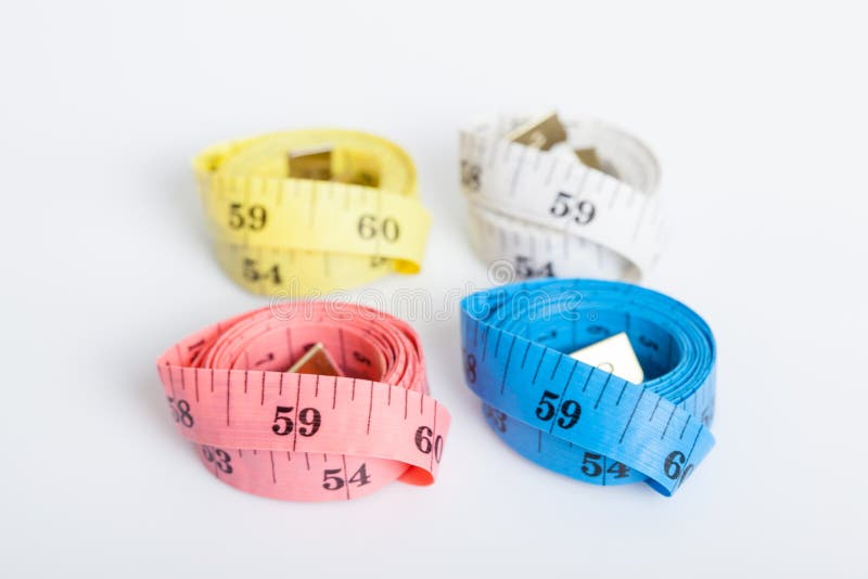 Four Roll of Colorful Measuring Tapes Stock Photo - Image of measure ...