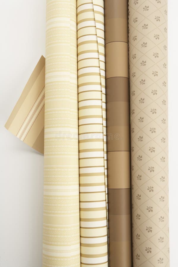 Four Rolls of Wall Paper One Swatch Stock Image - Image of brown ...