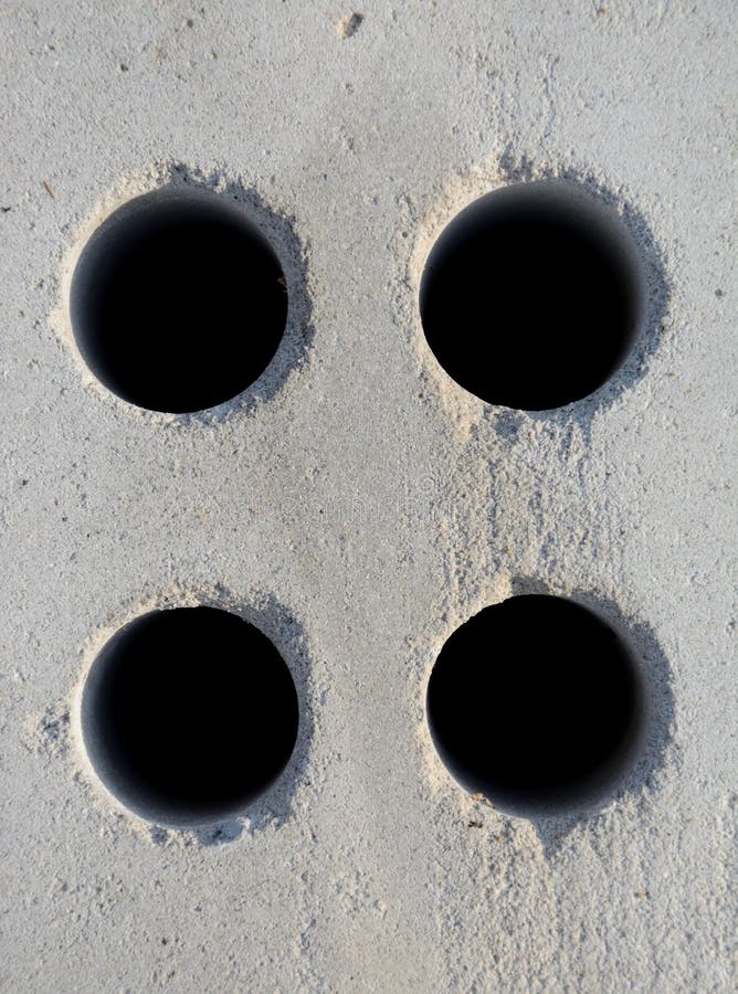 Four Round Holes in Grey Concrete Wall. Stock Image - Image of build ...