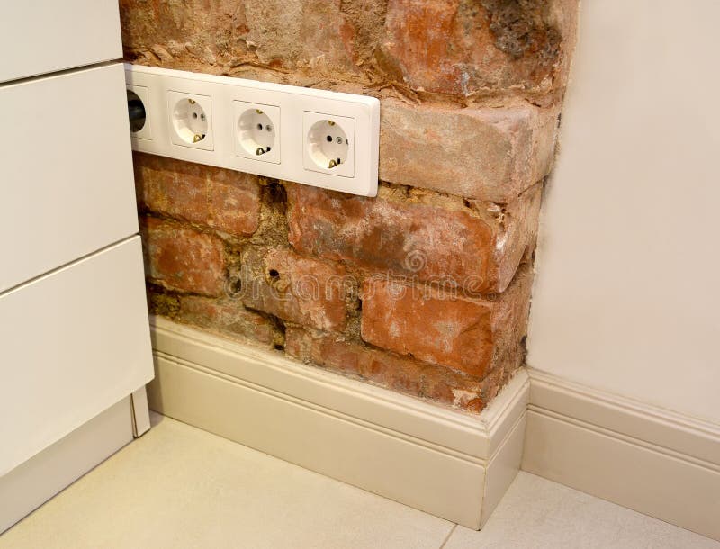 Four-seater Socket Installed on Old Brick Wall Indoors Stock Image ...