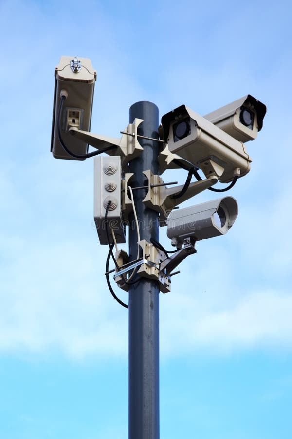 Four Security Cameras on Blue Sky Stock Photo - Image of safety, street ...
