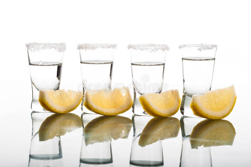 Four Shots of Vodka with Lemon Stock Photo - Image of white, four: 57582318