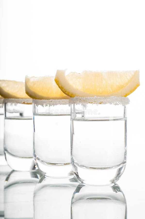 Four Shots of Vodka with Lemon Stock Image - Image of transparent ...