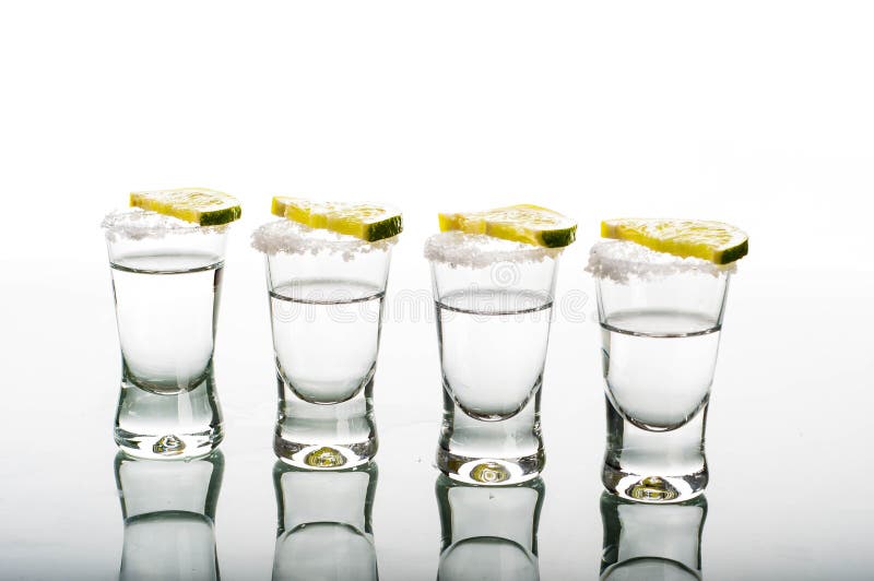 Four Shots of Vodka with Lemon Stock Image - Image of isolated ...